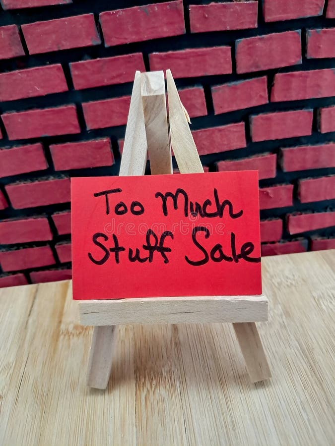 Too Much Stuff Sale Message on a Wood Easel Stock Illustration ...