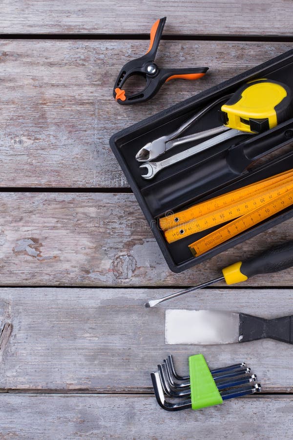 Tool Box and Different Tools on Wooden Background. Stock Image - Image ...