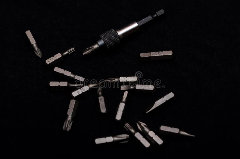 Tool Carbon Steel Bits with Bit Holder on Black Background in Dark Key ...