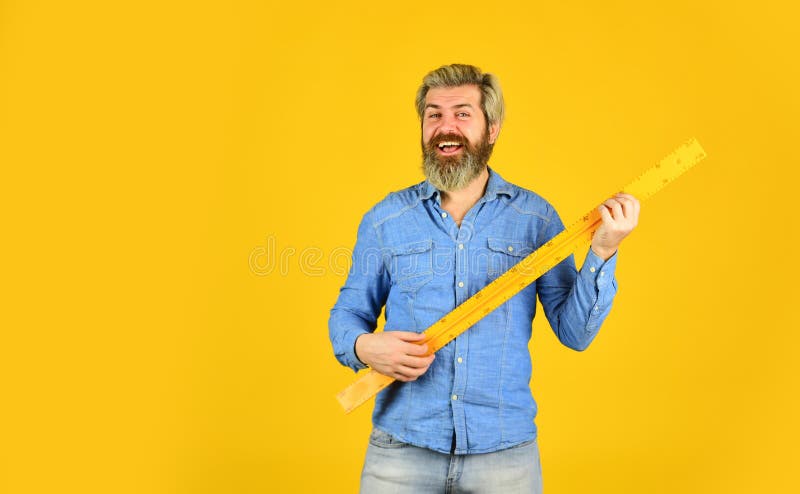 Tool for Graphics. Mature Bearded Man Hold Measuring Ruler. Study at ...