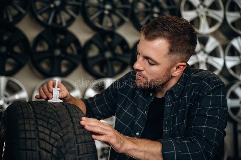 Tool in Hand, Checking the Quality. Man Worker is Maintenance Station ...