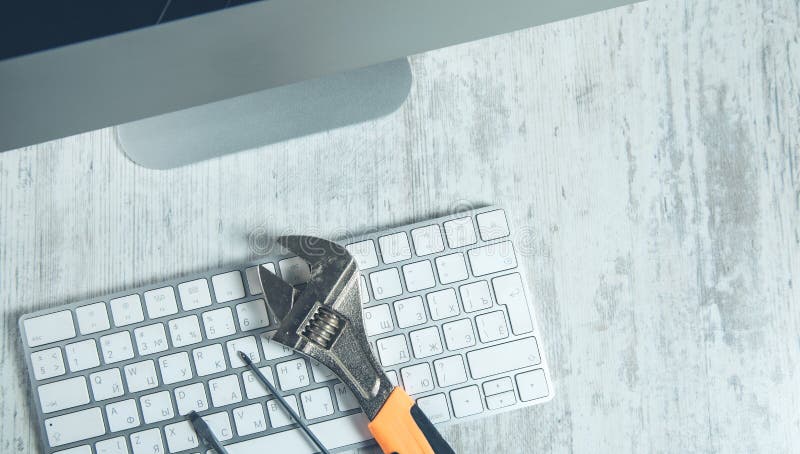 Tool on the Keyboard on the Desk. Stock Photo - Image of technician ...