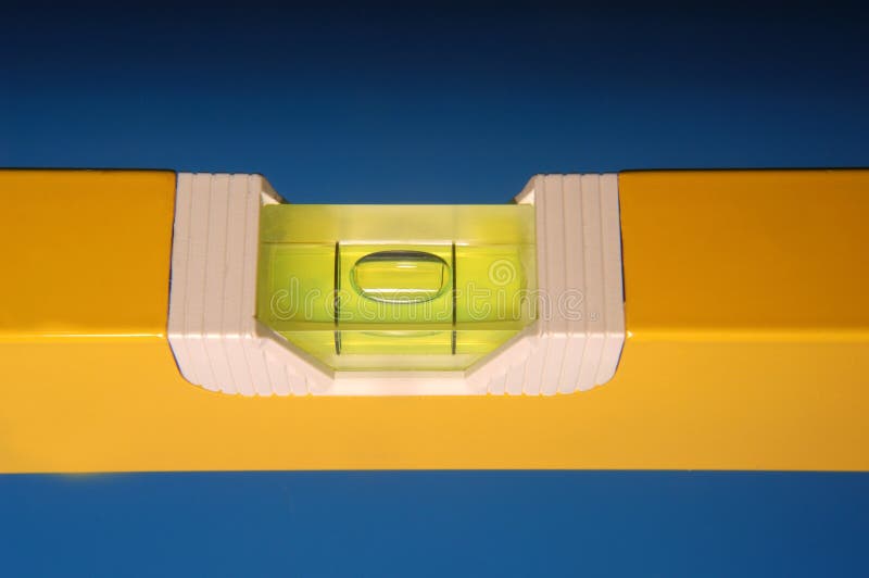 A Tool Level on Blue Background Stock Image - Image of liquid ...