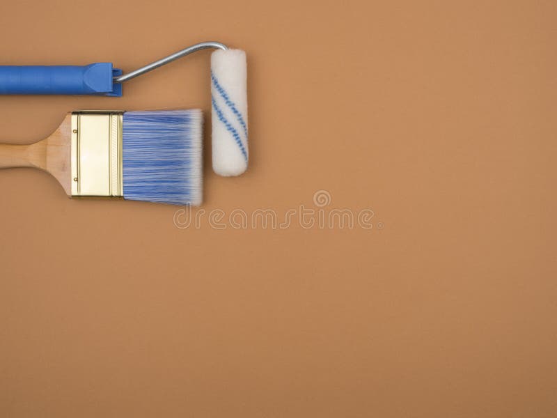 Tool for Paint Finishing Work on Beige Background. the Brush and Roller ...