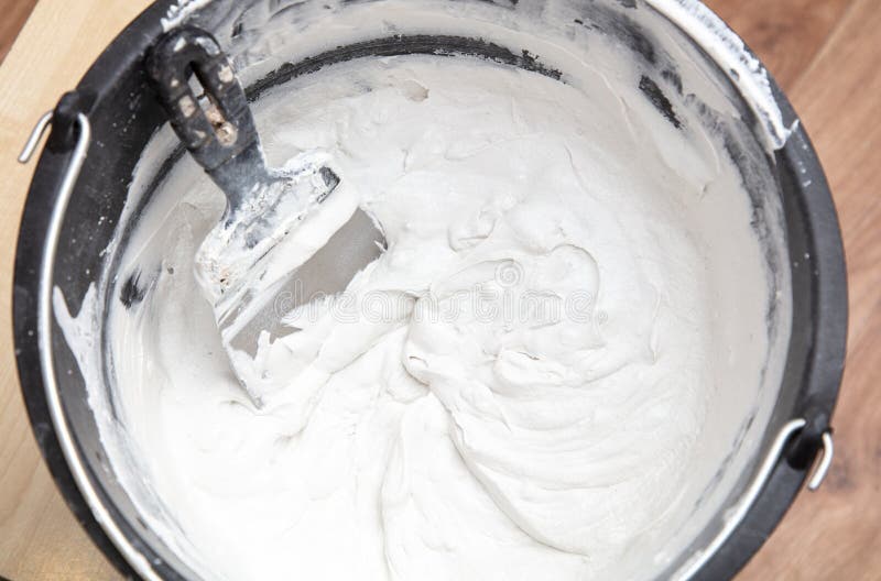 Tool for Plastering a Bucket with a Mixture. Stock Photo - Image of ...