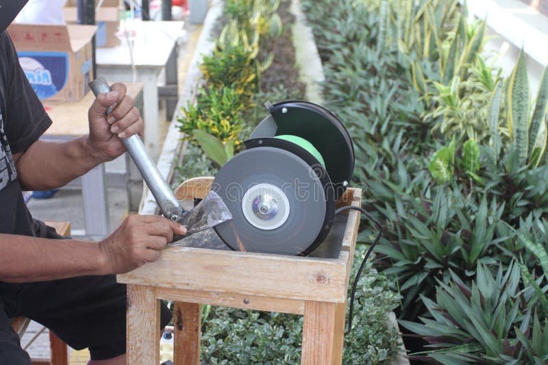 Tool Sharpening with a Bench Grinder Stock Photo - Image of ...