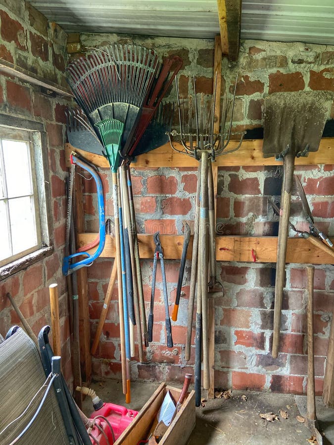 Rustic Tool Shed with Gardening and Household Equipment All Organized ...