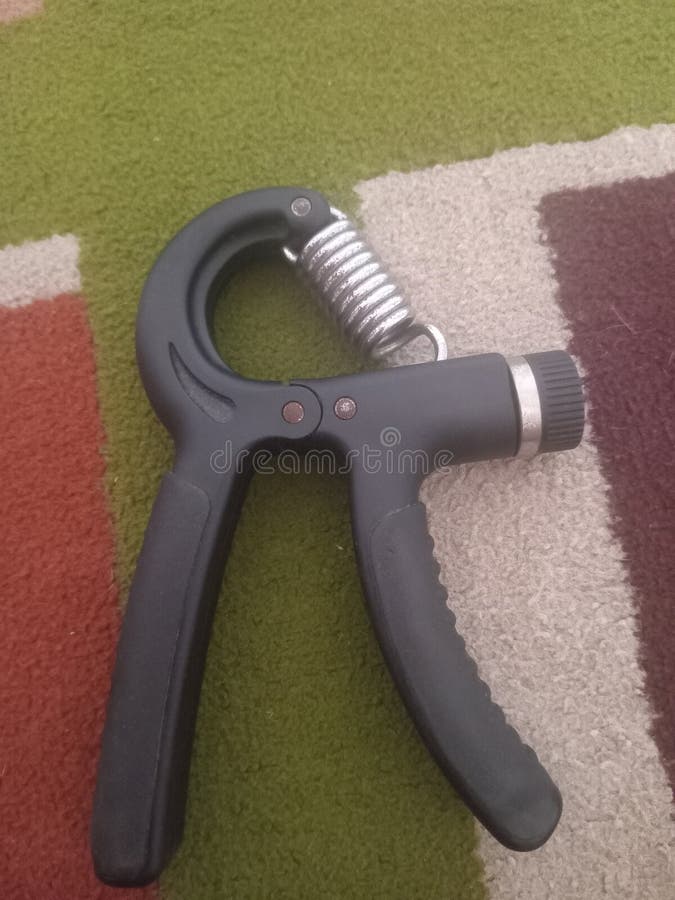 A Tool for Training Hand Muscles Called a Handgrip Stock Image - Image ...