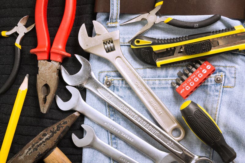 Toolkit in jeans pocket stock image. Image of craftsperson - 2041467
