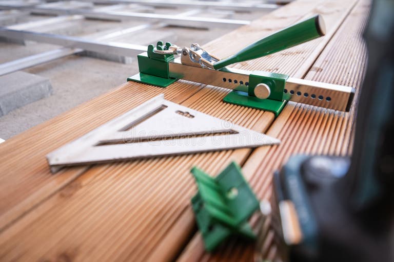 Tools Arranged on Wooden Planks for Precise Measurement and Alignment ...