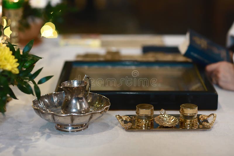 Tools for Baby Baptism. Eley in the Hands of a Priest Stock Image ...