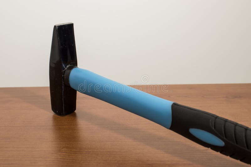 Tools, Blue and Black Hammer on a Wood Table Stock Photo - Image of ...