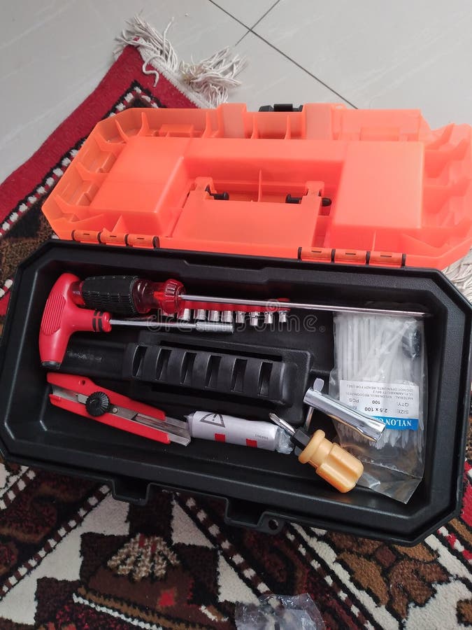 Tools box on the carpet stock image. Image of repair - 307193039