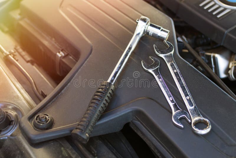 Tools in the car engine stock image. Image of inspection - 167084447