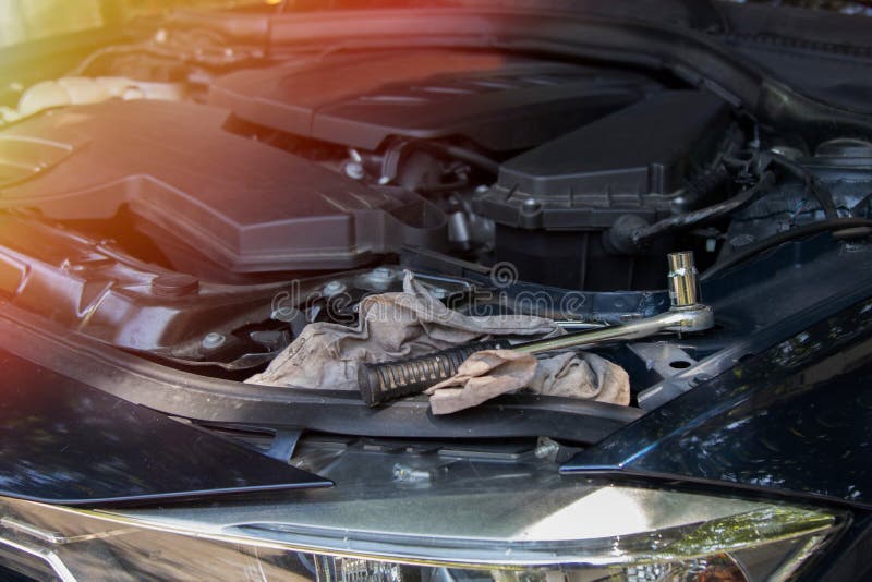 Tools on the car engine stock photo. Image of profession - 167084434