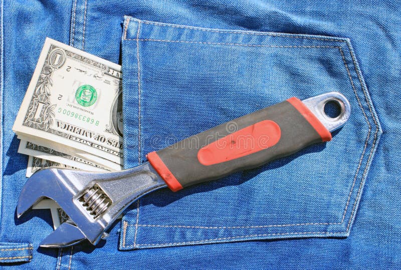 Tools and cash in pocket stock photo. Image of engineer - 39526650