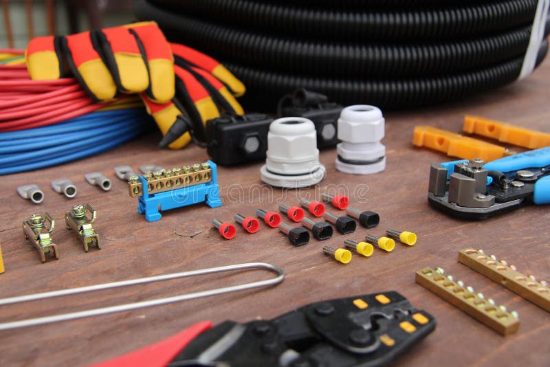 Tools for Electrical Work Laid Out on a Wooden Surface of Brown. Top ...