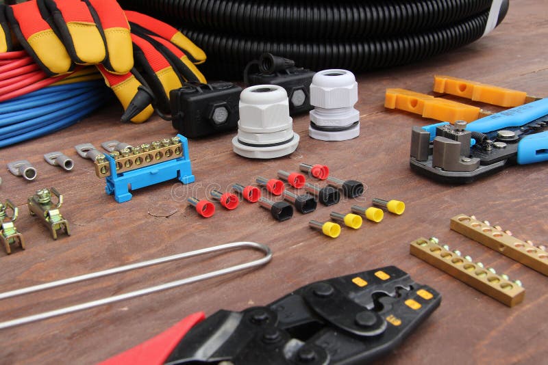 Tools for Electrical Work Laid Out on a Wooden Surface of Brown Stock ...