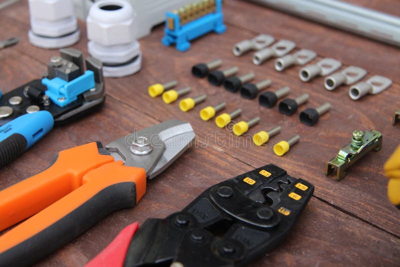 Tools for Electrical Work Laid Out on a Wooden Surface of Brown Stock ...