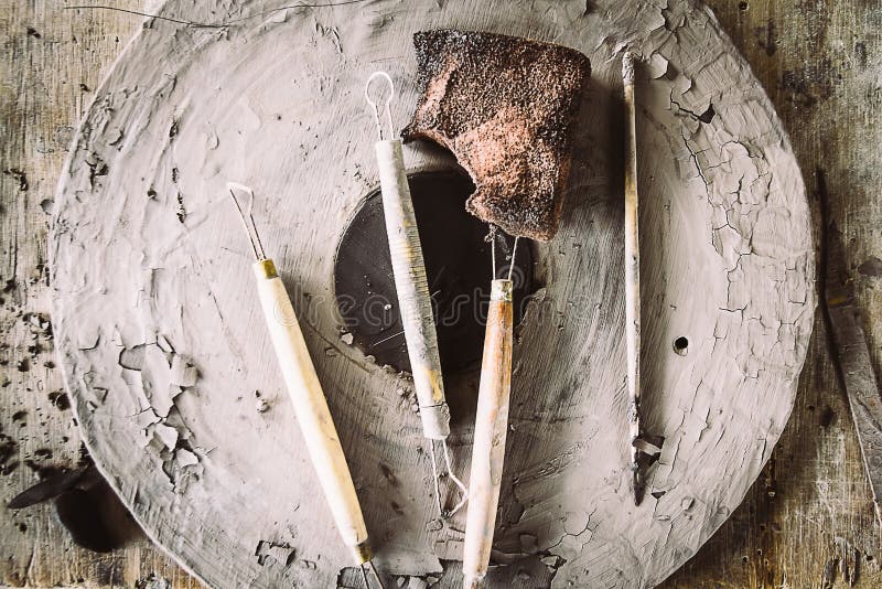 Tools for Forming Clay with Pots on Wood Background Stock Photo - Image ...