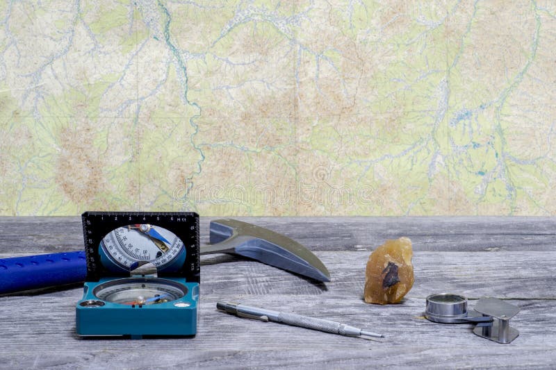 Tools Geologist Laid Out on a Wooden Table on the Background of a ...