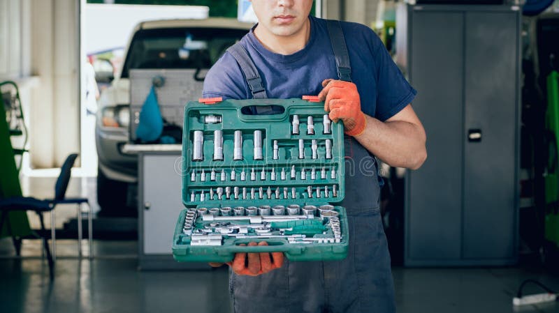 Tools at the Hands. Auto Repair Service Stock Photo - Image of engine ...