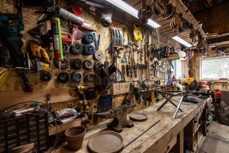 Tools Hanging Above Bench in Workshop Stock Photo - Image of abrasive ...