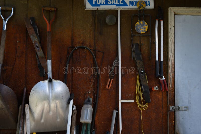 Tools Hanging on the Side of a Barn Stock Image - Image of ranch, work ...