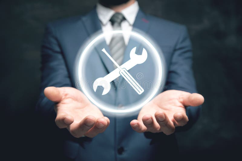 Tools Icon. Wrench and Screwdriver. the Man Holds in His Hand Stock ...