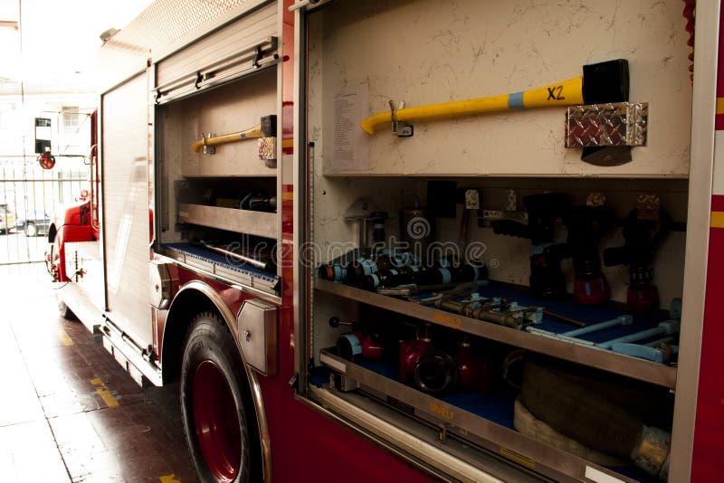Tools inside a firetruck stock photo. Image of hoses - 64535608