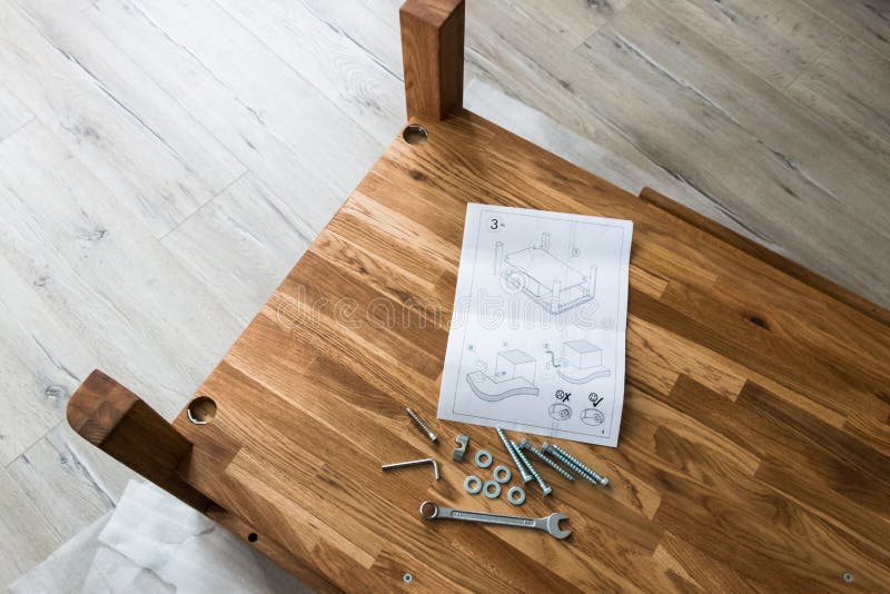 Tools and Instructions for Assembling a Wooden Table Stock Image ...