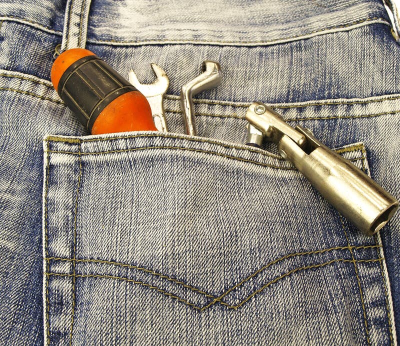 Tools in a jean pocket stock photo. Image of denim, angle - 29385586