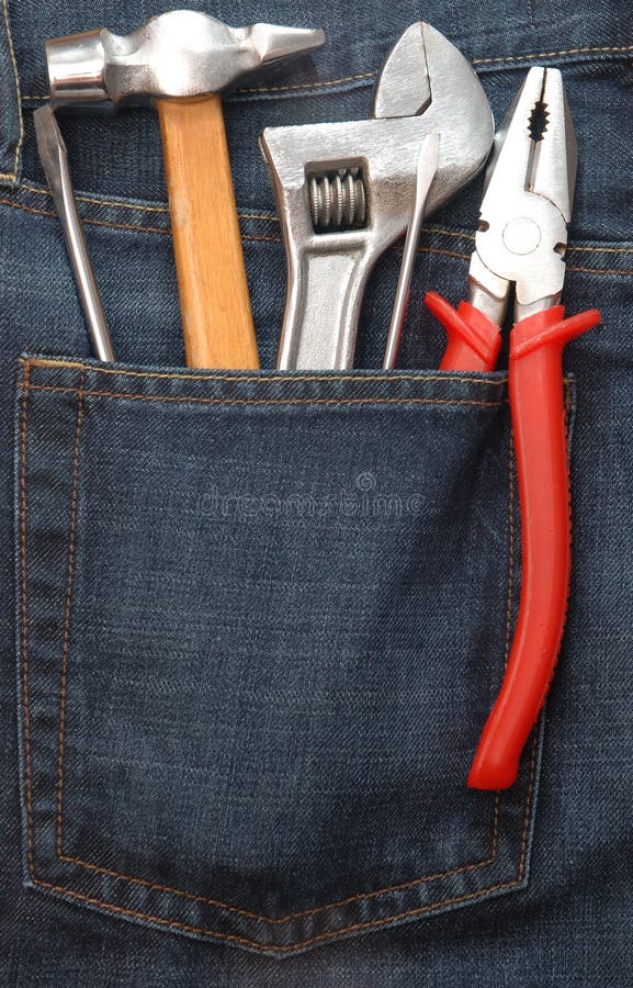 Tools on a pants pocket stock image. Image of instruments - 23964625
