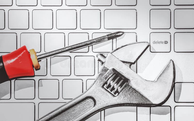 Tools on Keyboard of Computer Stock Photo - Image of hacking, repair ...