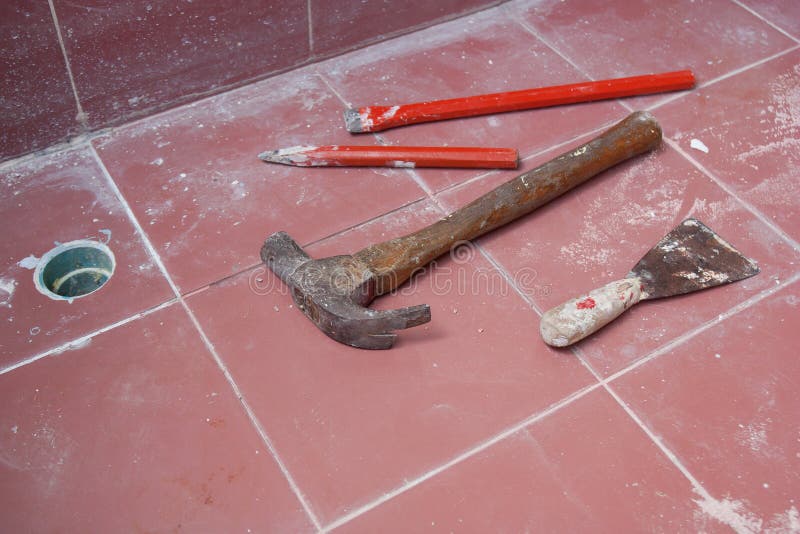 Tools Lay on the Floor Tiles. Stock Image - Image of shadow, ground ...
