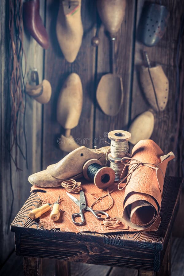 Tools, Leather and Threads in Cobbler Workplace Stock Photo - Image of ...