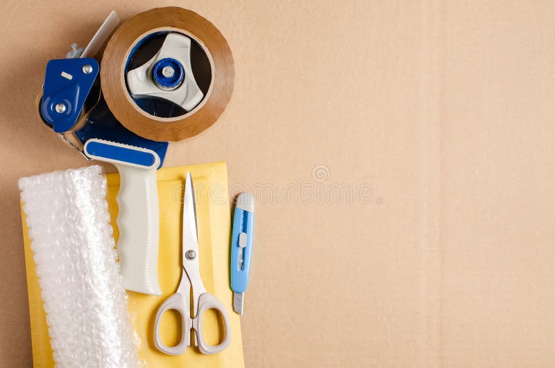 Tools for Packaging Goods in an Online Store. Brown Cardboard ...