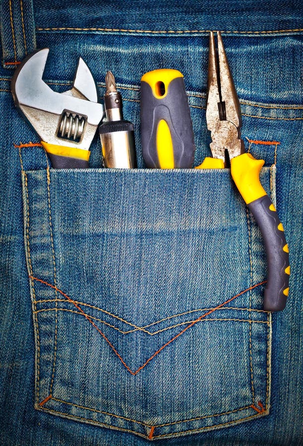 Tools on a pants pocket stock image. Image of instruments - 23964625