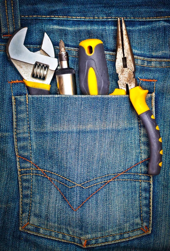 Tools on a pants pocket stock image. Image of instruments - 23964625
