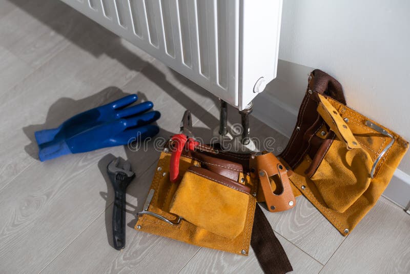 Tools on the radiator heat stock image. Image of vent - 261357043