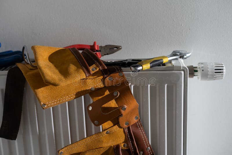 Tools on the radiator heat stock image. Image of plumbing - 266055481