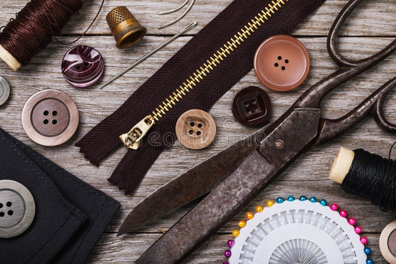 Tools for the Repair of Clothes on a Wooden Table Stock Photo - Image ...