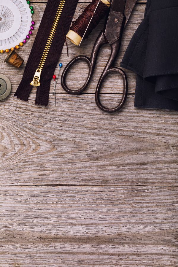 Tools for Repair and Tailoring Clothes on Wooden Table Stock Photo ...