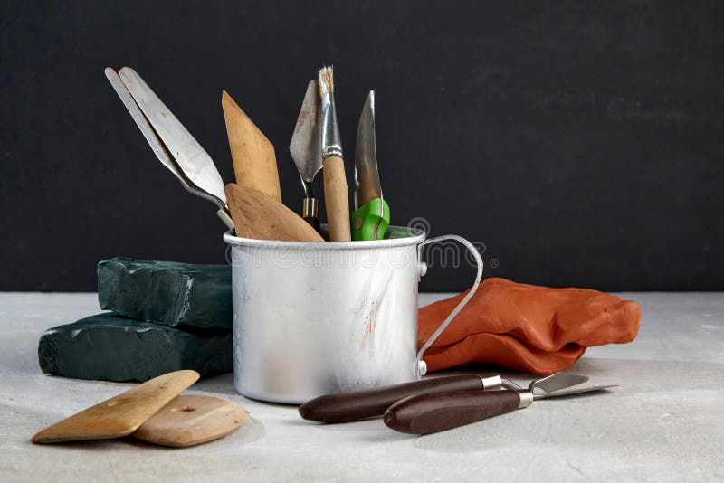 Tools for Sculpting and Modeling in an Aluminum Cup and a Piece of ...