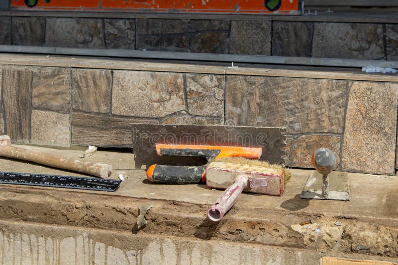 Tools on the Stairs,work on Laying Ceramic Tiles on the Stairs Stock ...