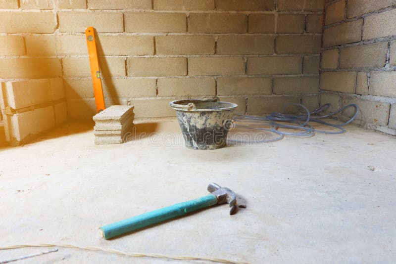 Tools and Equipment of Bricklayer in House Under Construction Stock ...