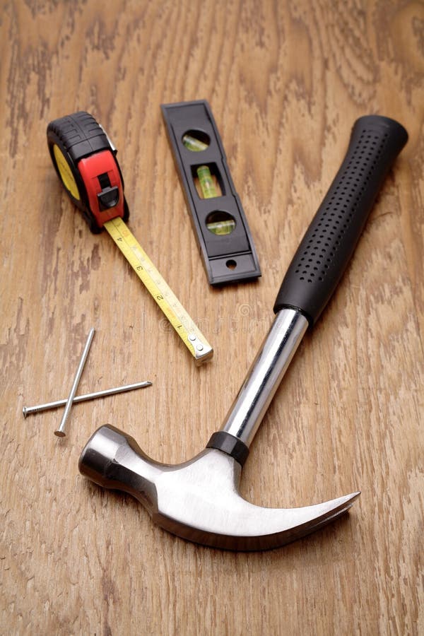 Tools on wooden panel stock image. Image of industrial - 4178203