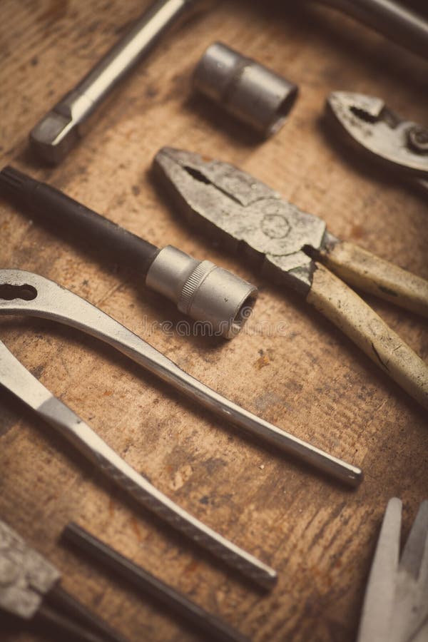 Tools on wooden plank stock photo. Image of plank, work - 69927444