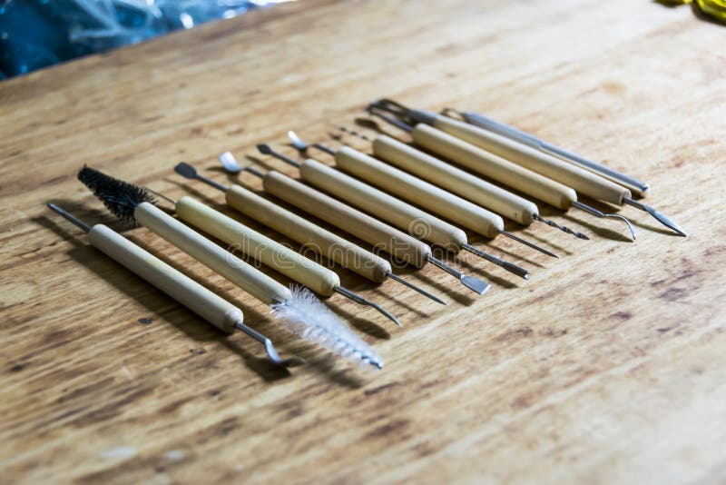 Tools for Working with Clay Modeling on a Wooden Background in a Stock ...