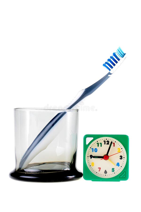 Tooth-brush and clock stock photo. Image of glass, medicine - 12863784